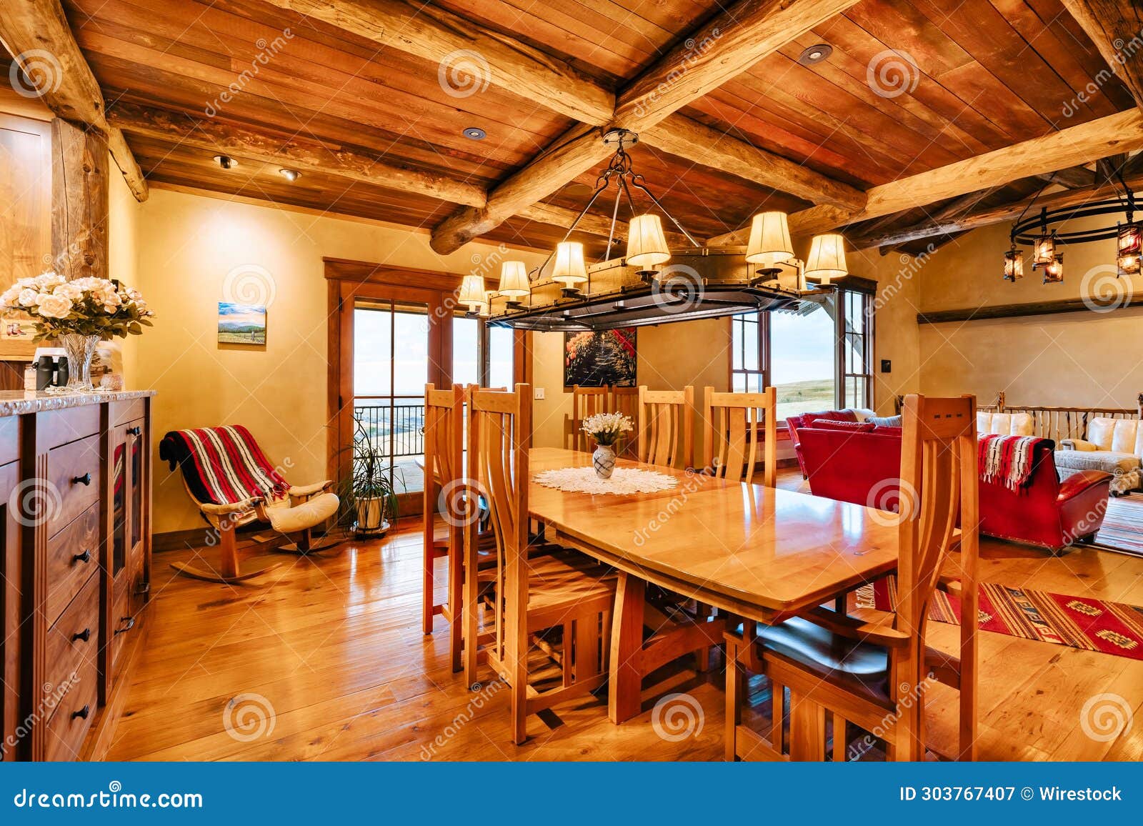 Open and Airy Dining Room Featuring Large Windows Along the Walls and ...