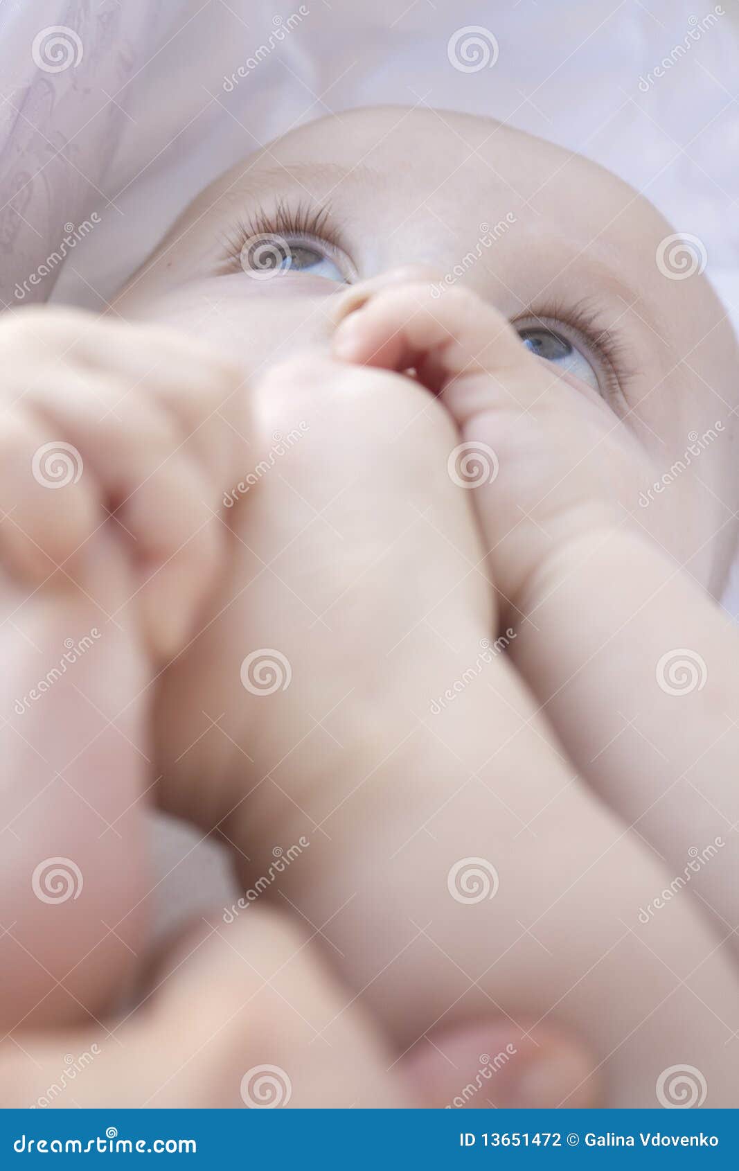 The Open Baby Lays on a Blanket Stock Photo - Image of little ...