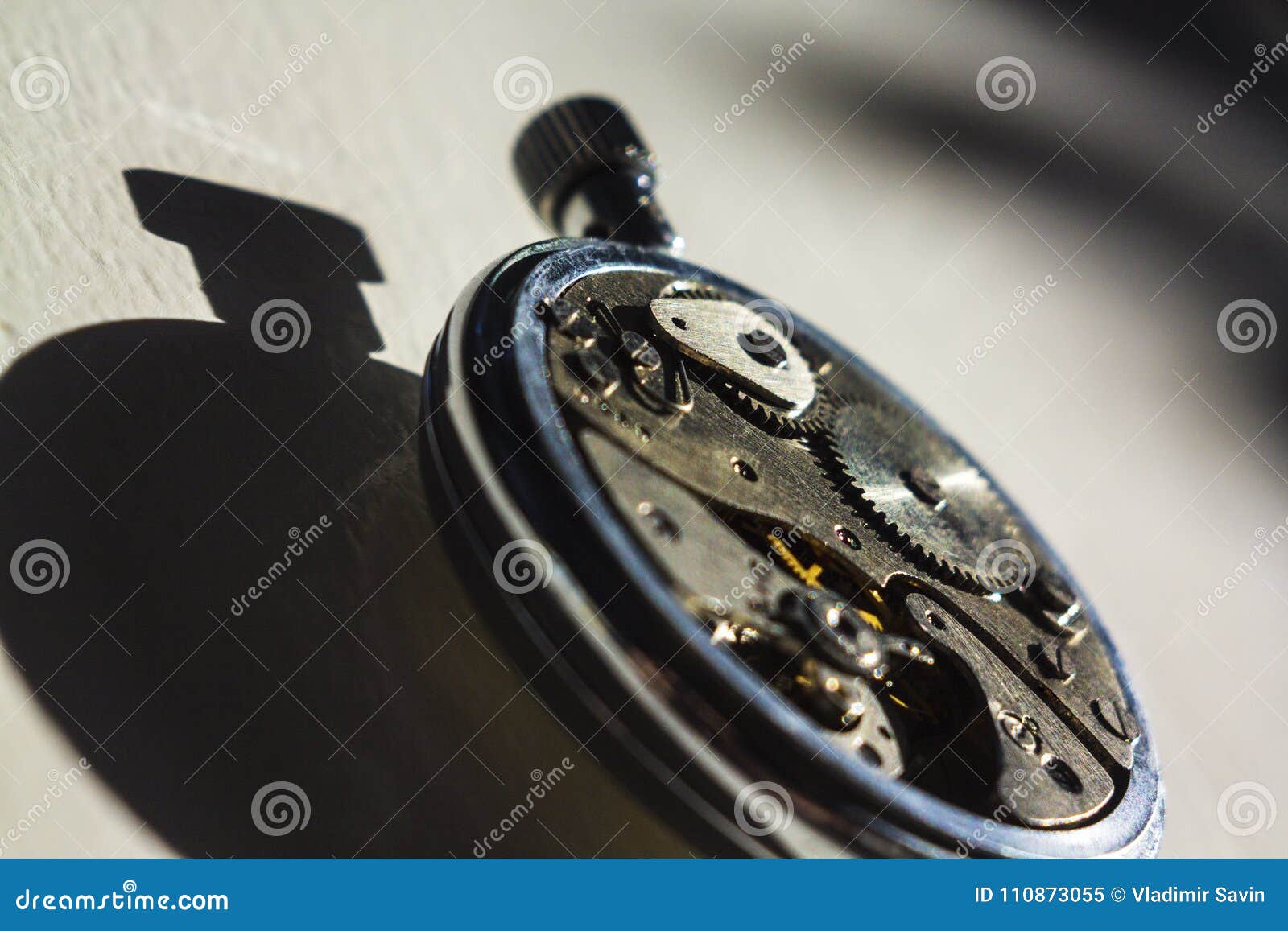 Pocket watch and shadow 2 stock image. Image of shadow - 110873055