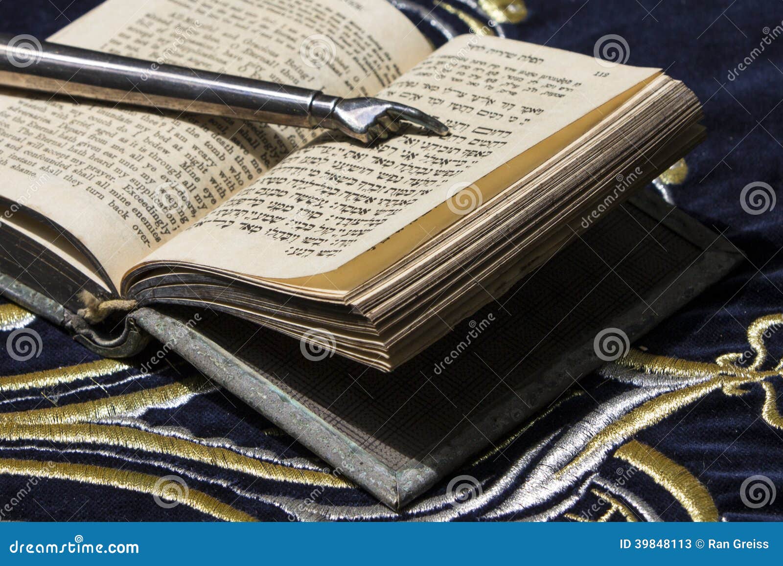 Open Bible Book in Hebrew with Silver Pointing Hand Stock Image - Image ...