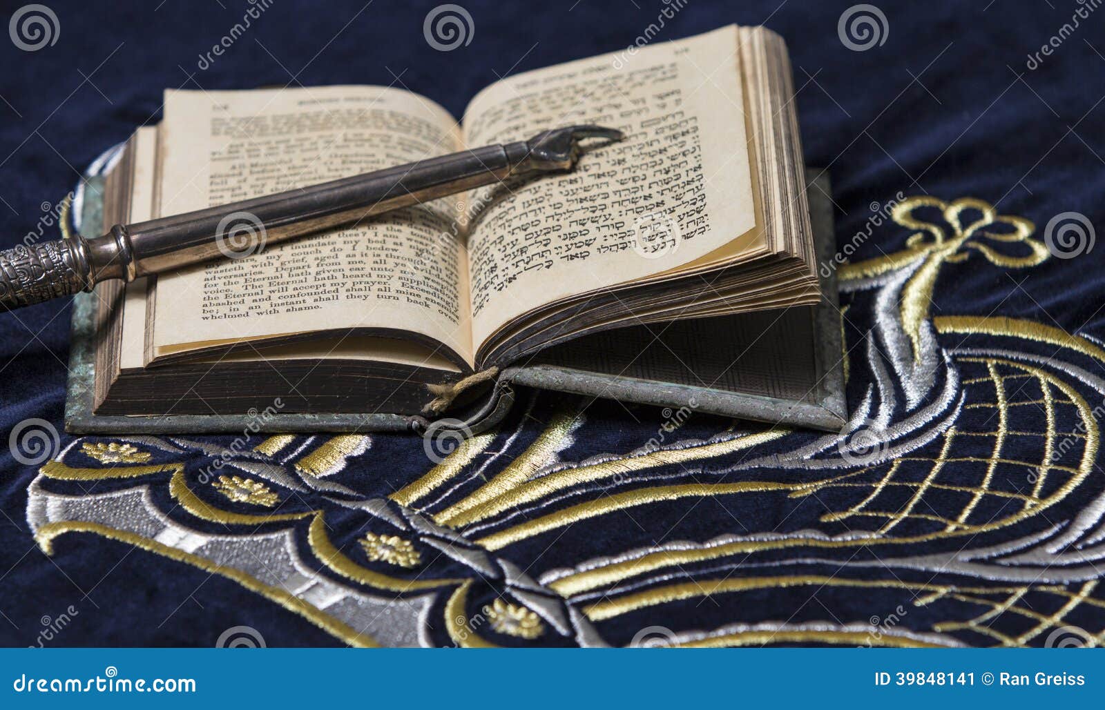 Open Bible Book in Hebrew with Silver Pointing Hand Stock Image - Image ...