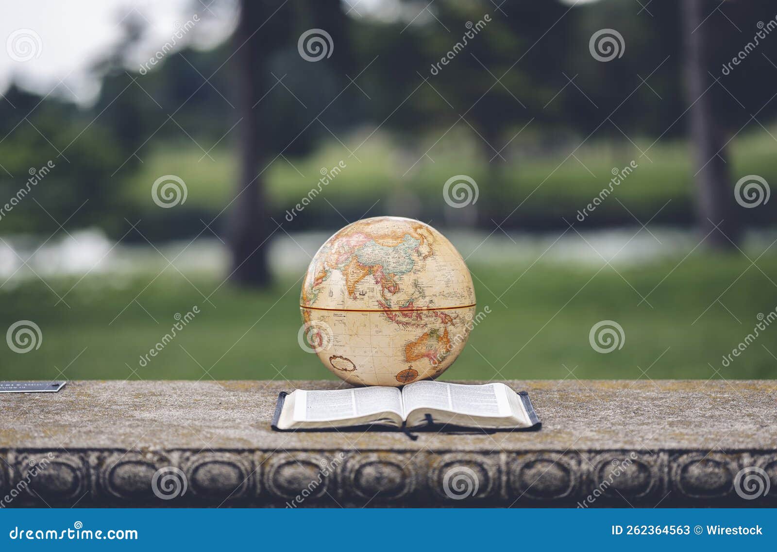 Open Bible and a Globe on a Bench Stock Image - Image of light, prayer ...