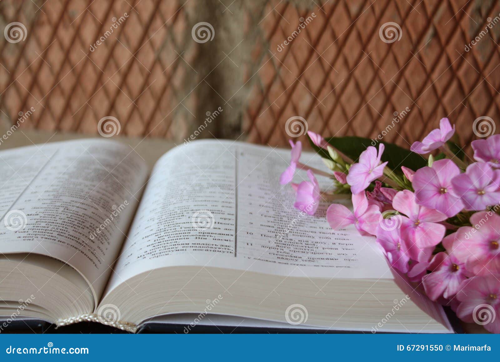 Open Bible With Flowers