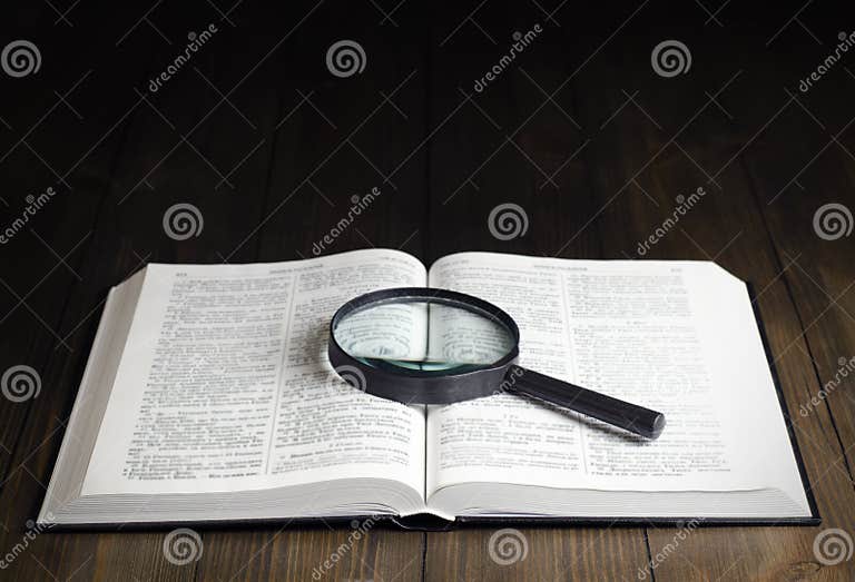 Open Bible. on the Table. Holy Bible, Scripture. Magnifier Stock Image ...