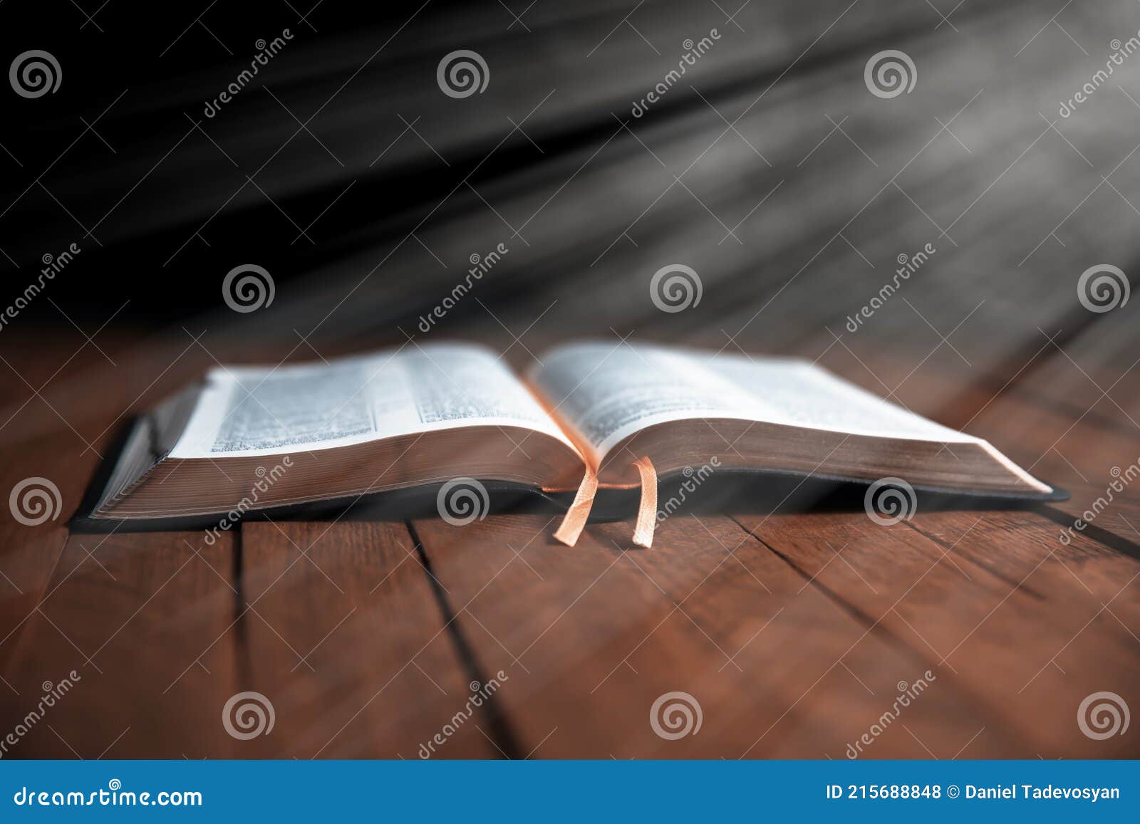 Open Bible on wooden table stock photo. Image of reading - 215688848