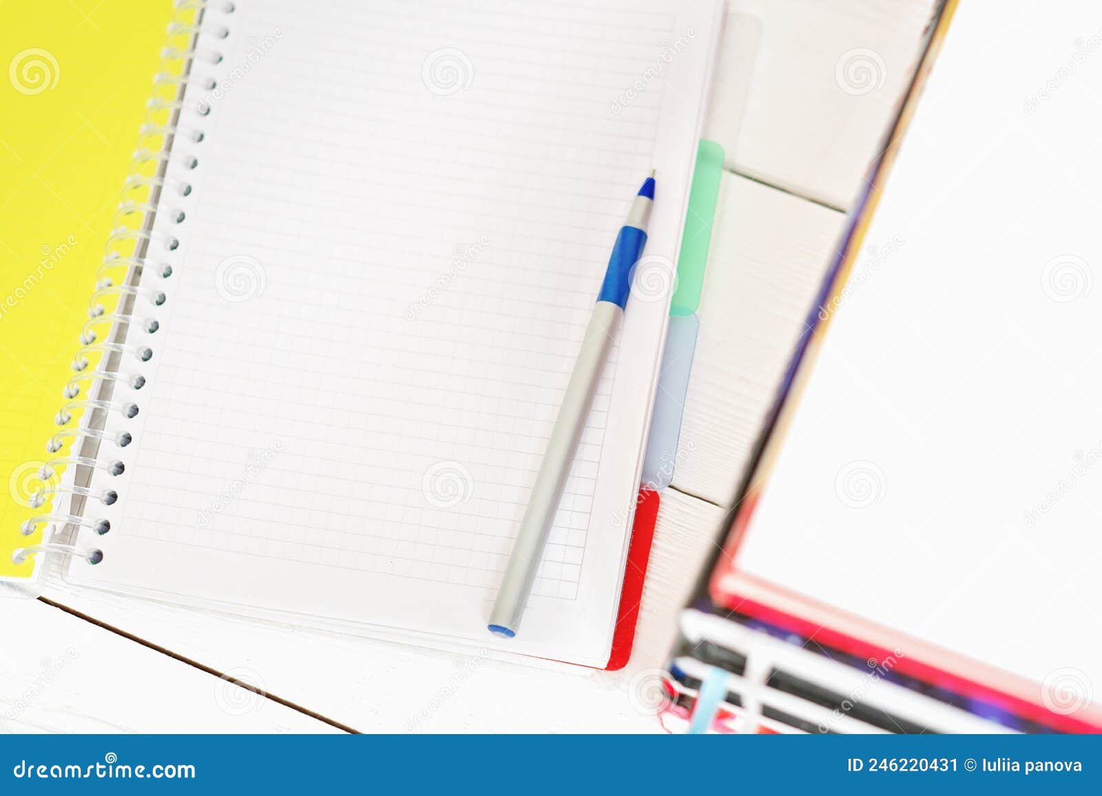 Open Blank Notepad with Pen and Stack of Books. White Table, Working ...