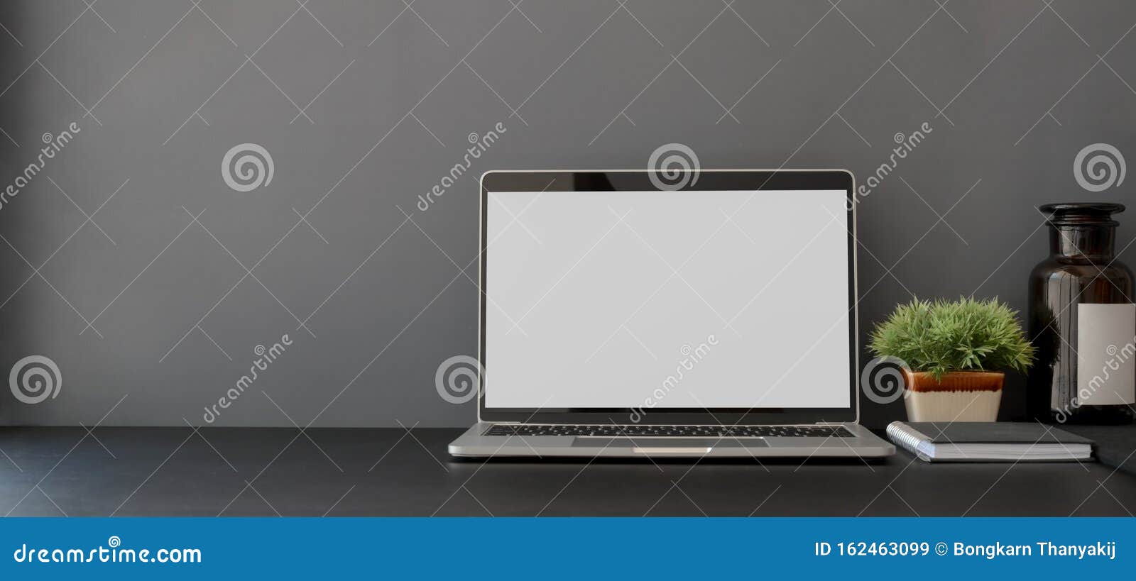Open Blank Screen Laptop Computer in Dark Trendy Workplace with Copy ...