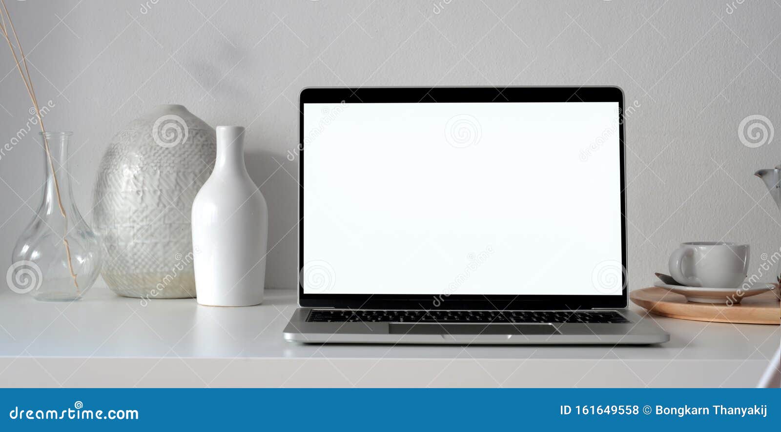 Open Blank Screen Laptop Computer in Modern Workspace with Ceramic ...