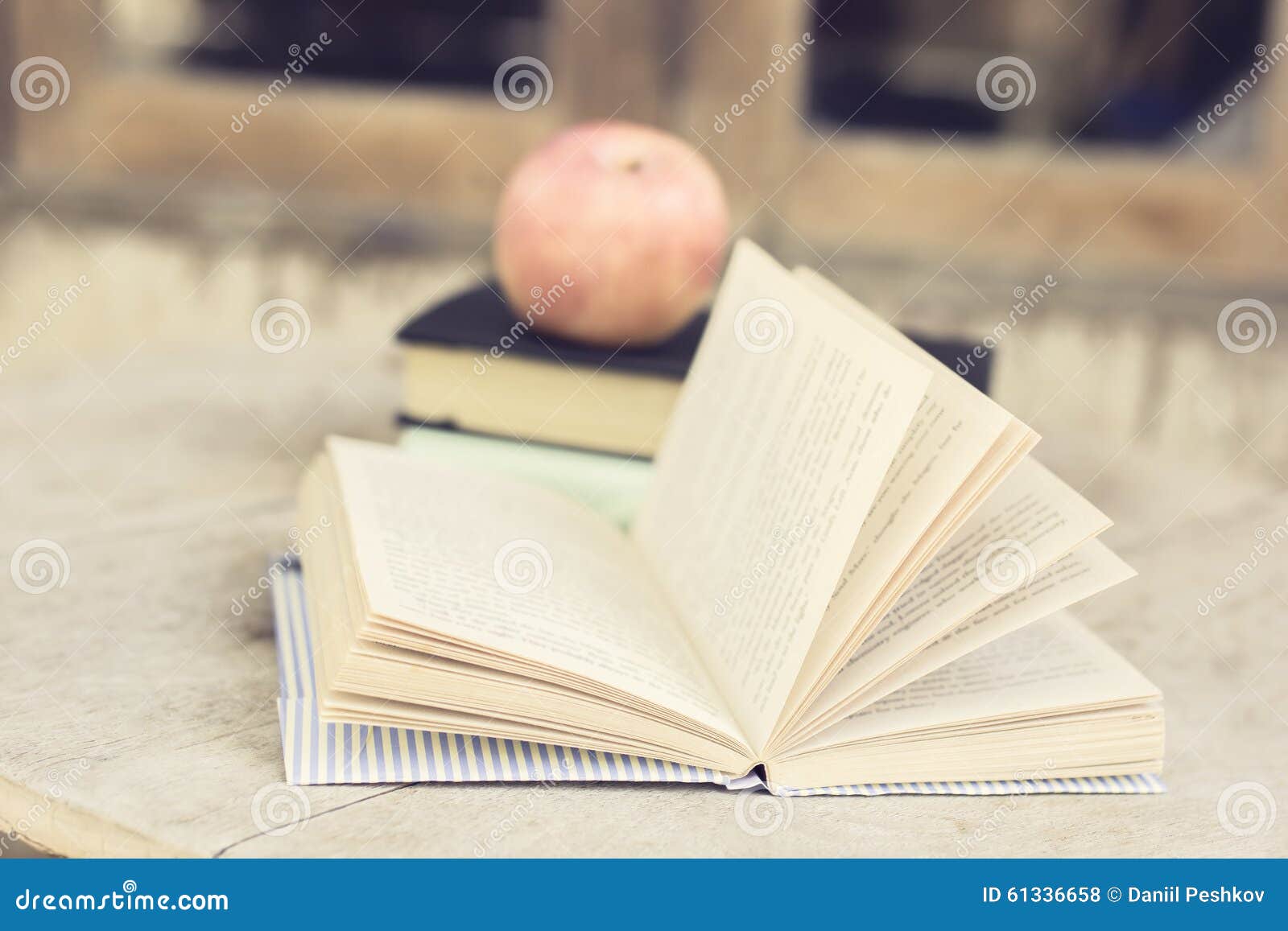 Open Book and Apple on a Wooden Table Stock Photo - Image of read ...
