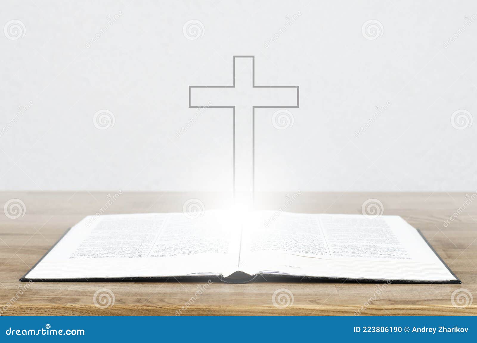 Open Book Bible. Light from the Book. Cross of Jesus. Stock Photo ...