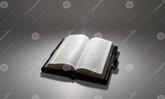 Open Book with Black Cover Rests on Gray Surface, Casting Shadow and ...