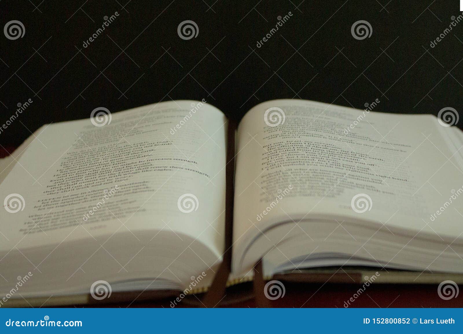 An Open Book with a Bookmark between the Pages Stock Photo - Image of ...