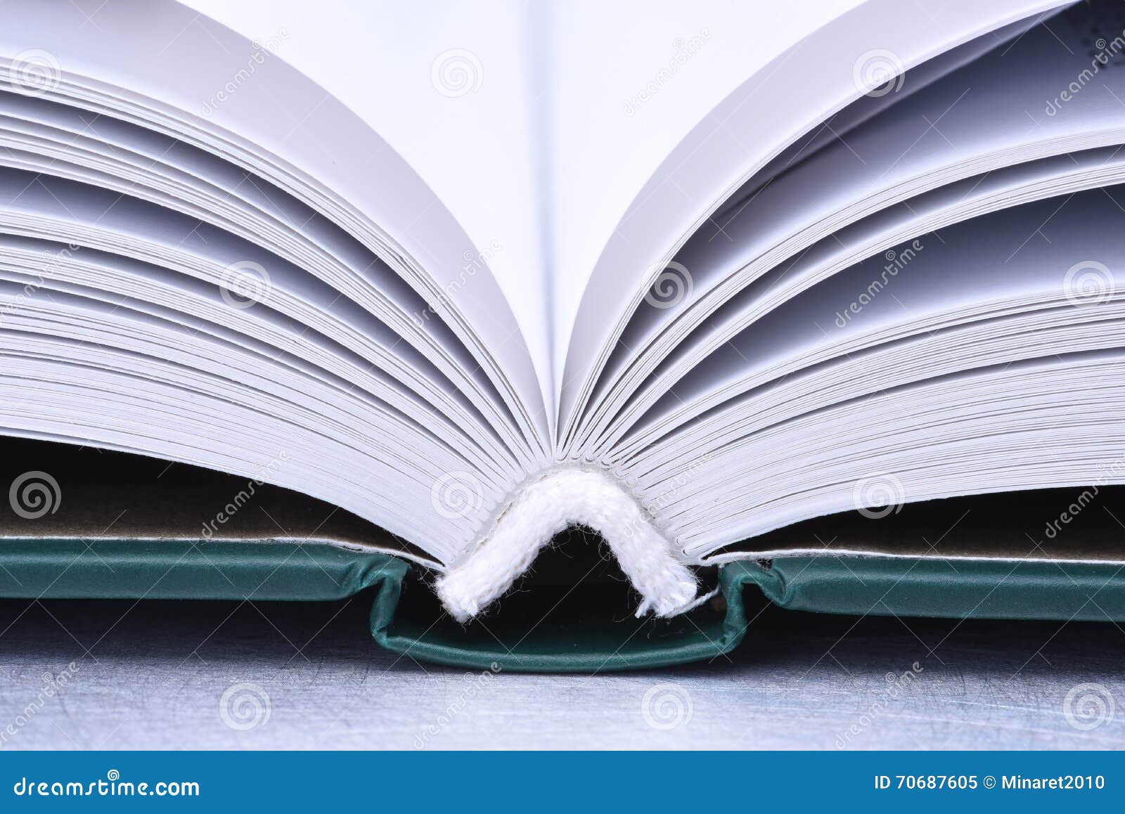 Open Book Closeup on Grey Metal Surface Stock Image - Image of ...