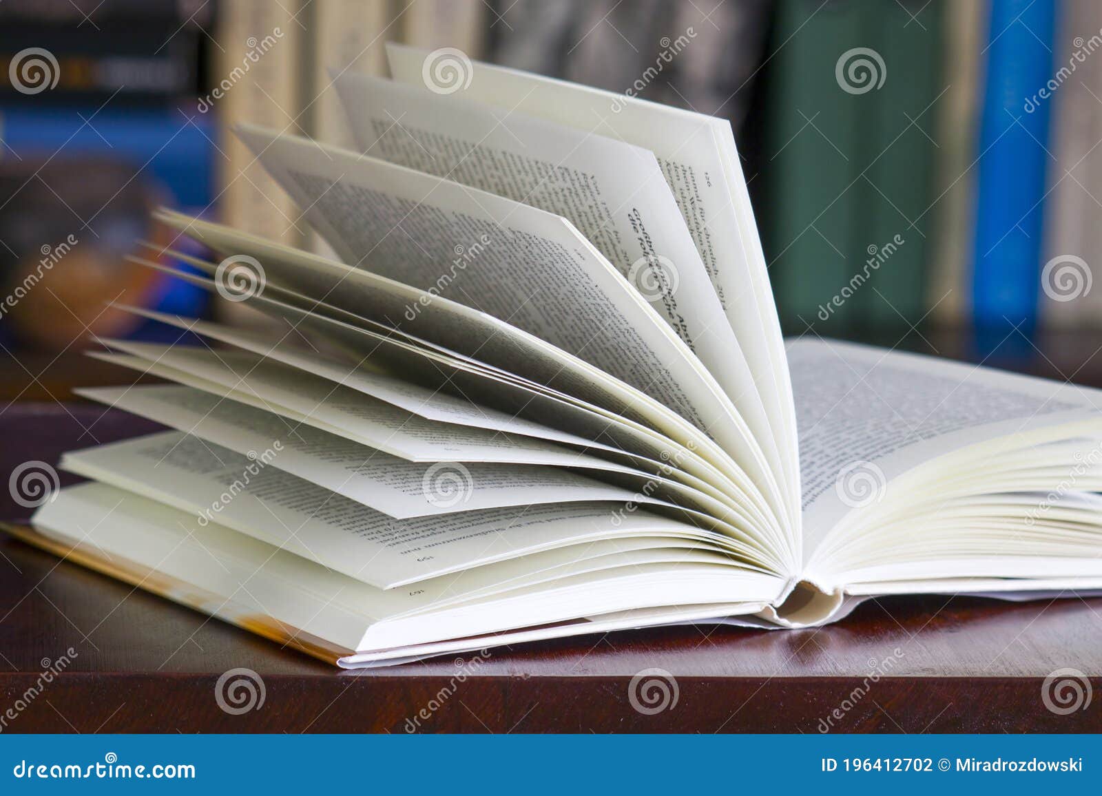 Open book on the desk stock photo. Image of open, colorful - 196412702