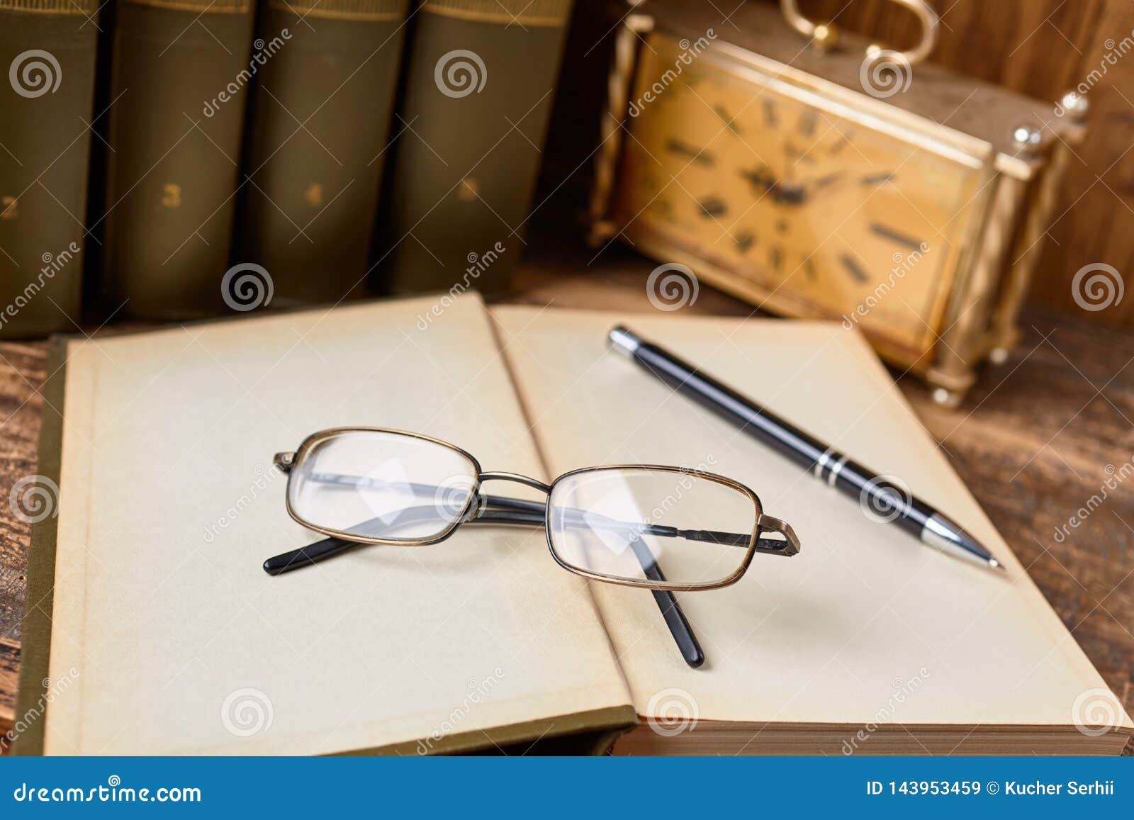 Open Book with Eyeglasses and a Pen for Notes Stock Image - Image of ...
