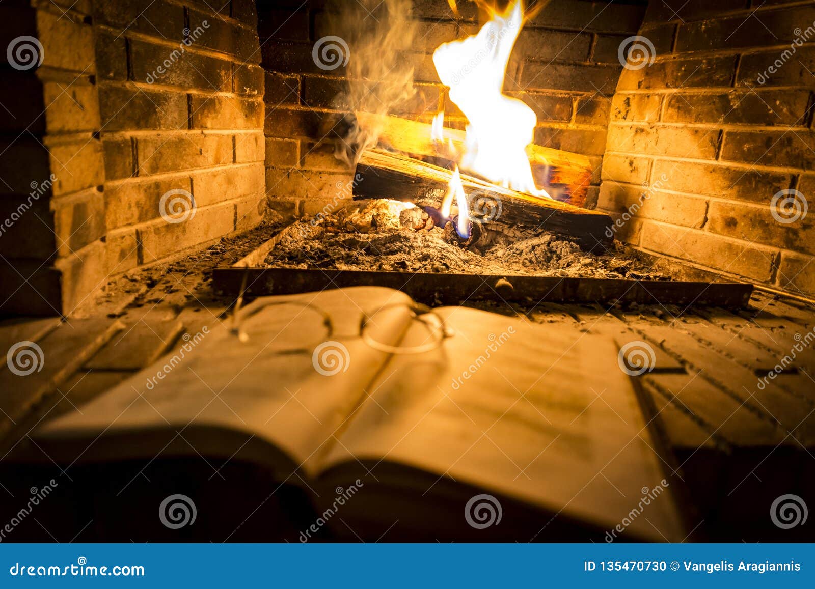 Open Book beside Burning Fireplace Stock Photo - Image of hardcover ...
