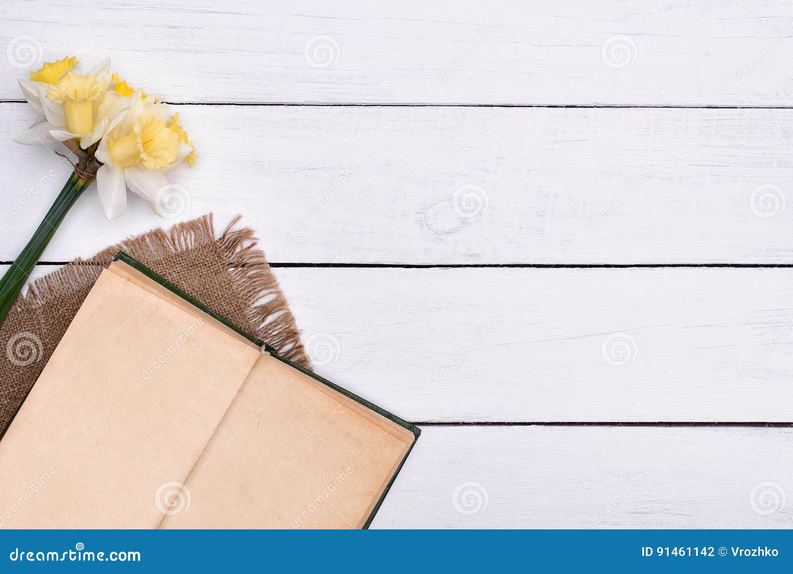 Open Book with Flower on Wooden Table Background Top View Stock Photo ...