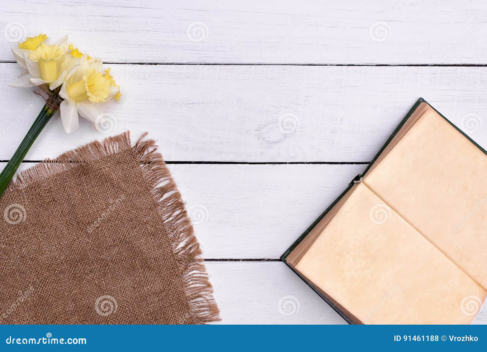Open Book with Flower on Wooden Table Background Top View Stock Photo ...