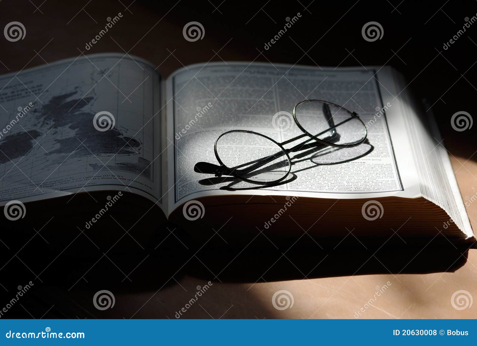 Open book with glasses stock photo. Image of glasses - 20630008