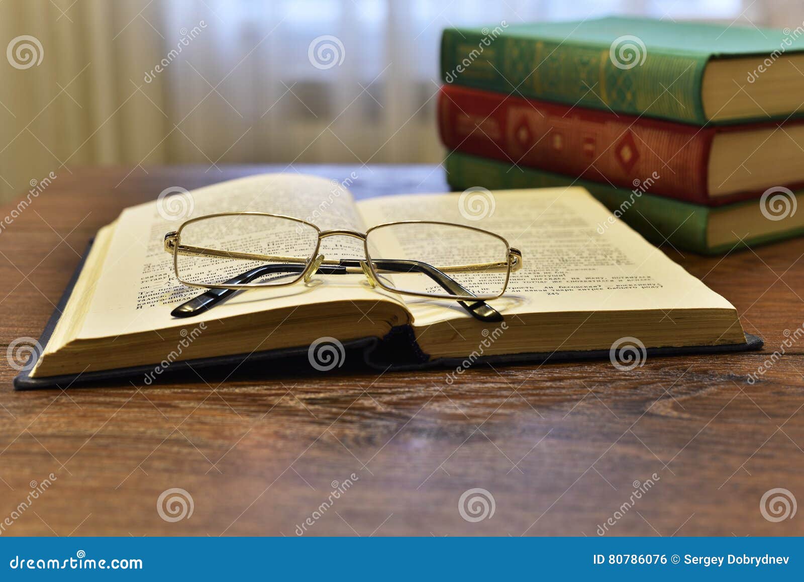 Open Book with Glasses and Stack of Books Stock Photo - Image of book ...
