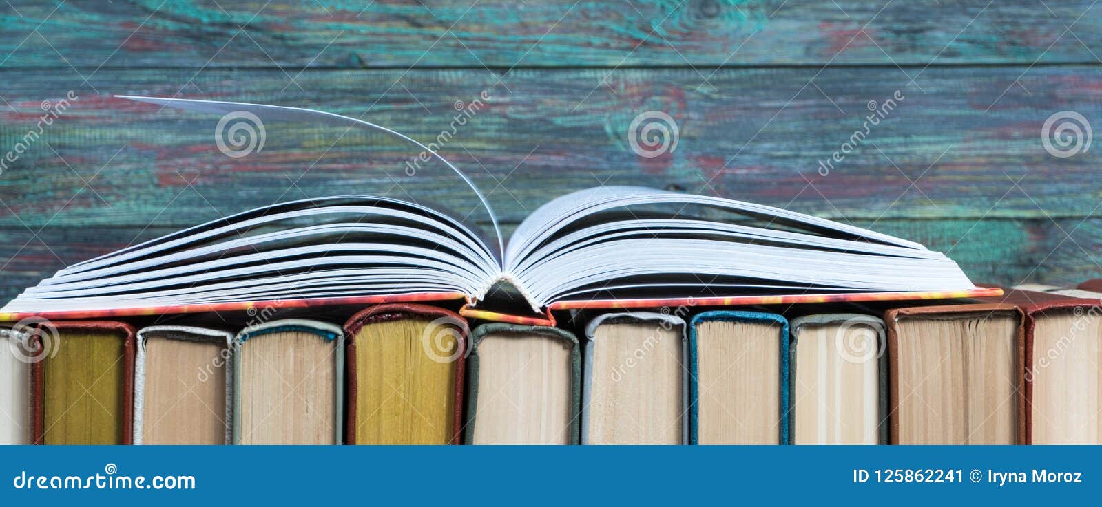 Open Book Hardback on Stack Books Stock Image - Image of abstract, book ...