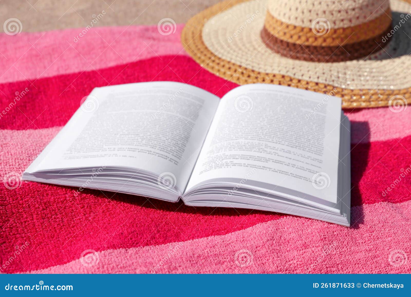 Open Book, Hat and Striped Towel on Sandy Beach Stock Image - Image of ...