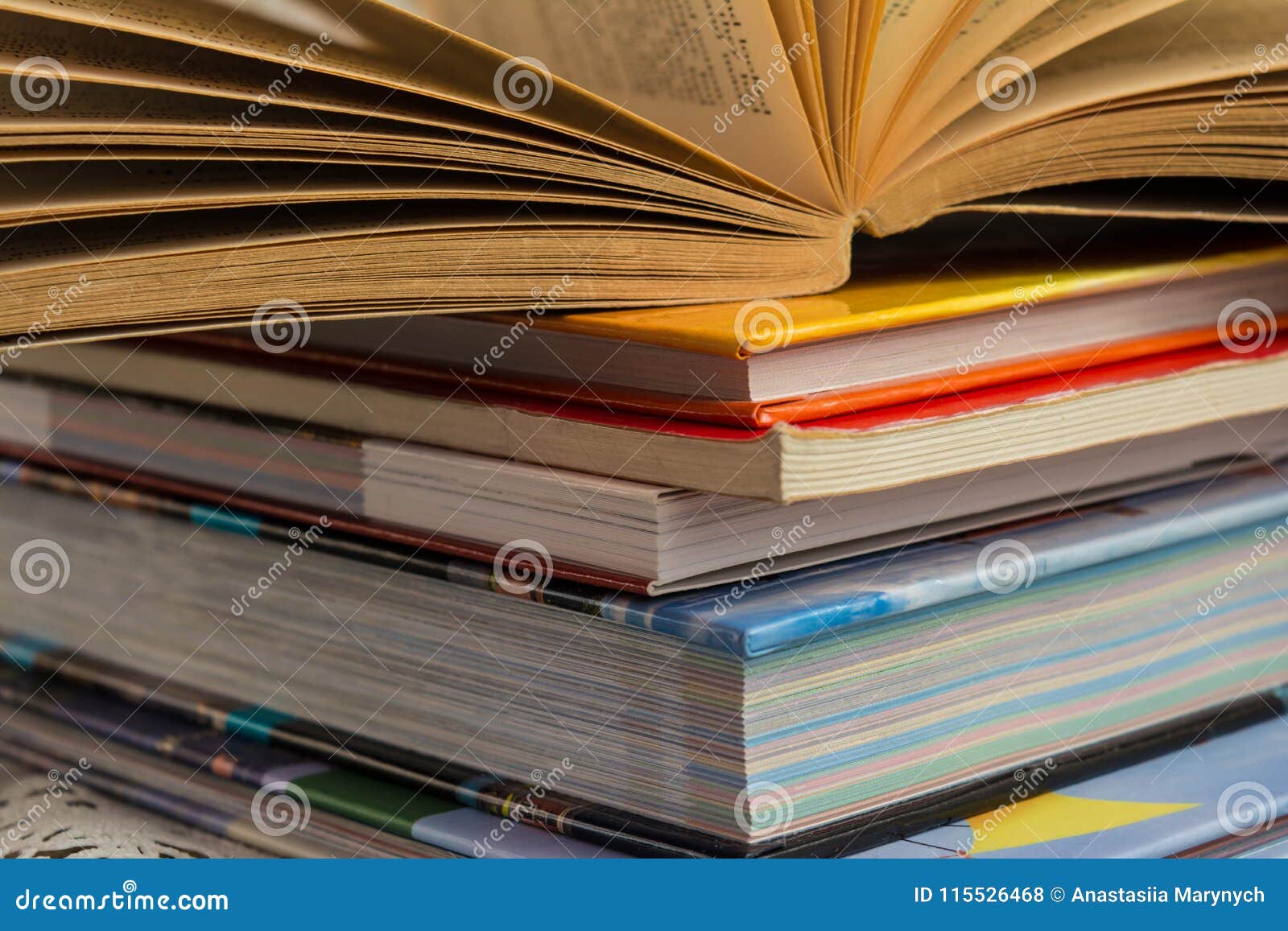 Open Book on Heap of Closed Books, Study and Teaching Concept Stock ...