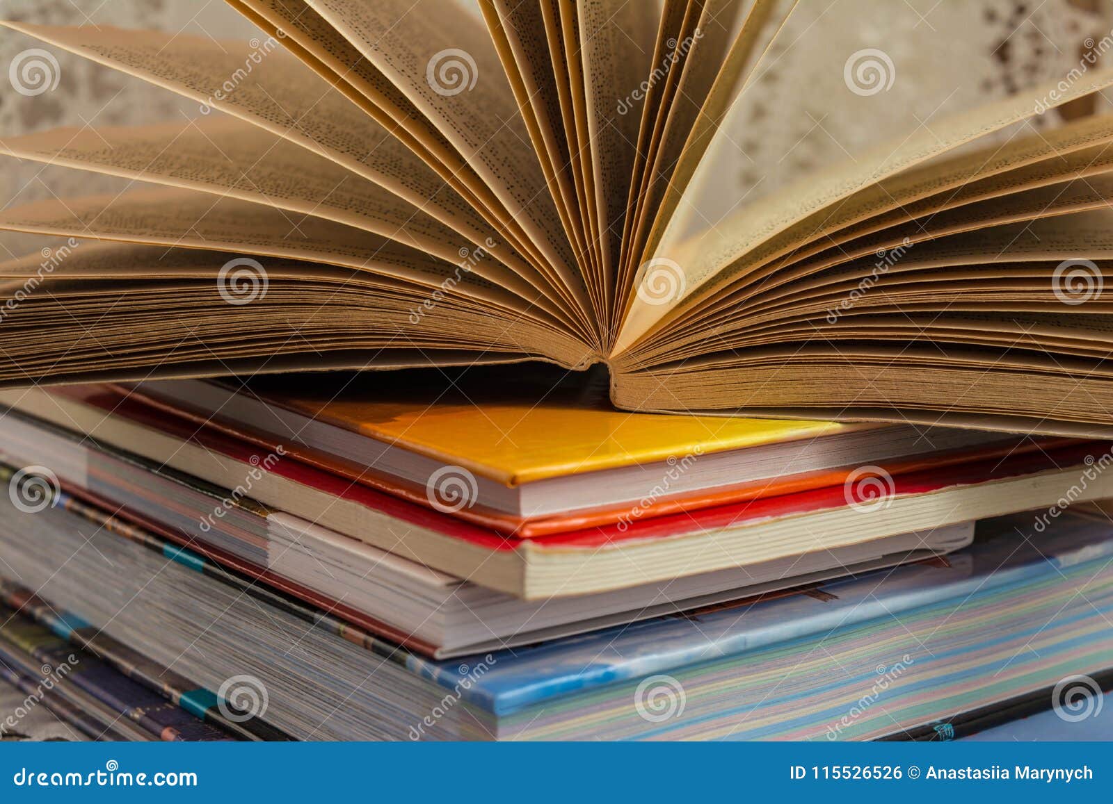 Open Book on Heap of Closed Books, Study and Teaching Concept Stock ...