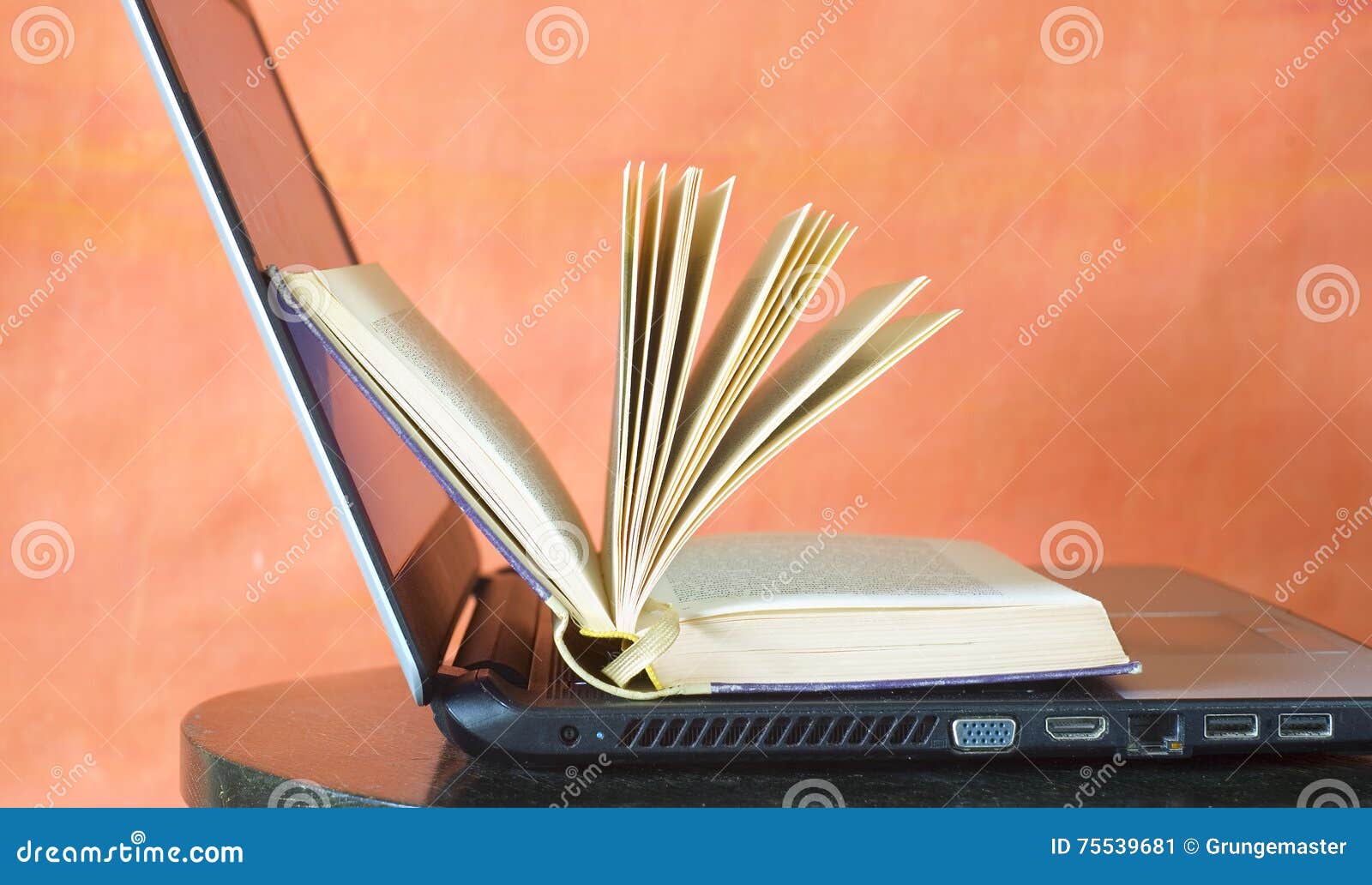 Open book and laptop, stock image. Image of education - 75539681
