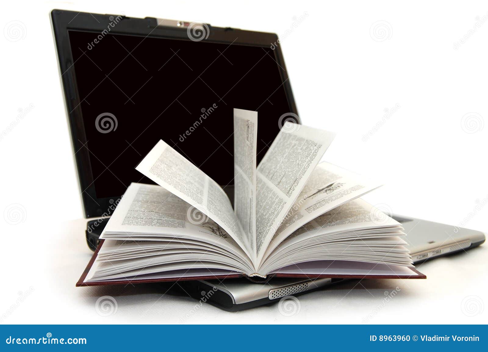 The Open Book Laying on Laptop Stock Photo - Image of laptop, laying ...