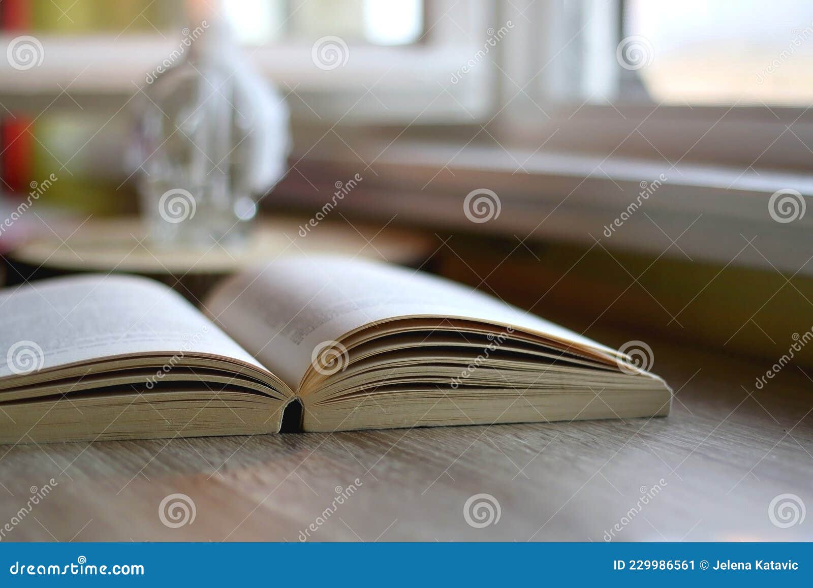 Open Book and Lit Candle stock image. Image of library - 229986561