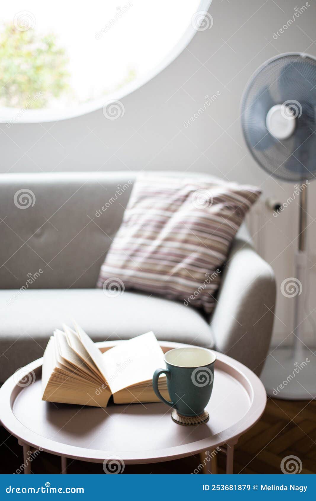Open Book on a Living Room Table Stock Image - Image of lamp, paintings ...