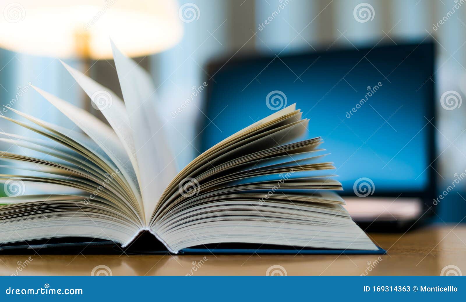 Open Book Lying on the Table in the Library Stock Image - Image of ...