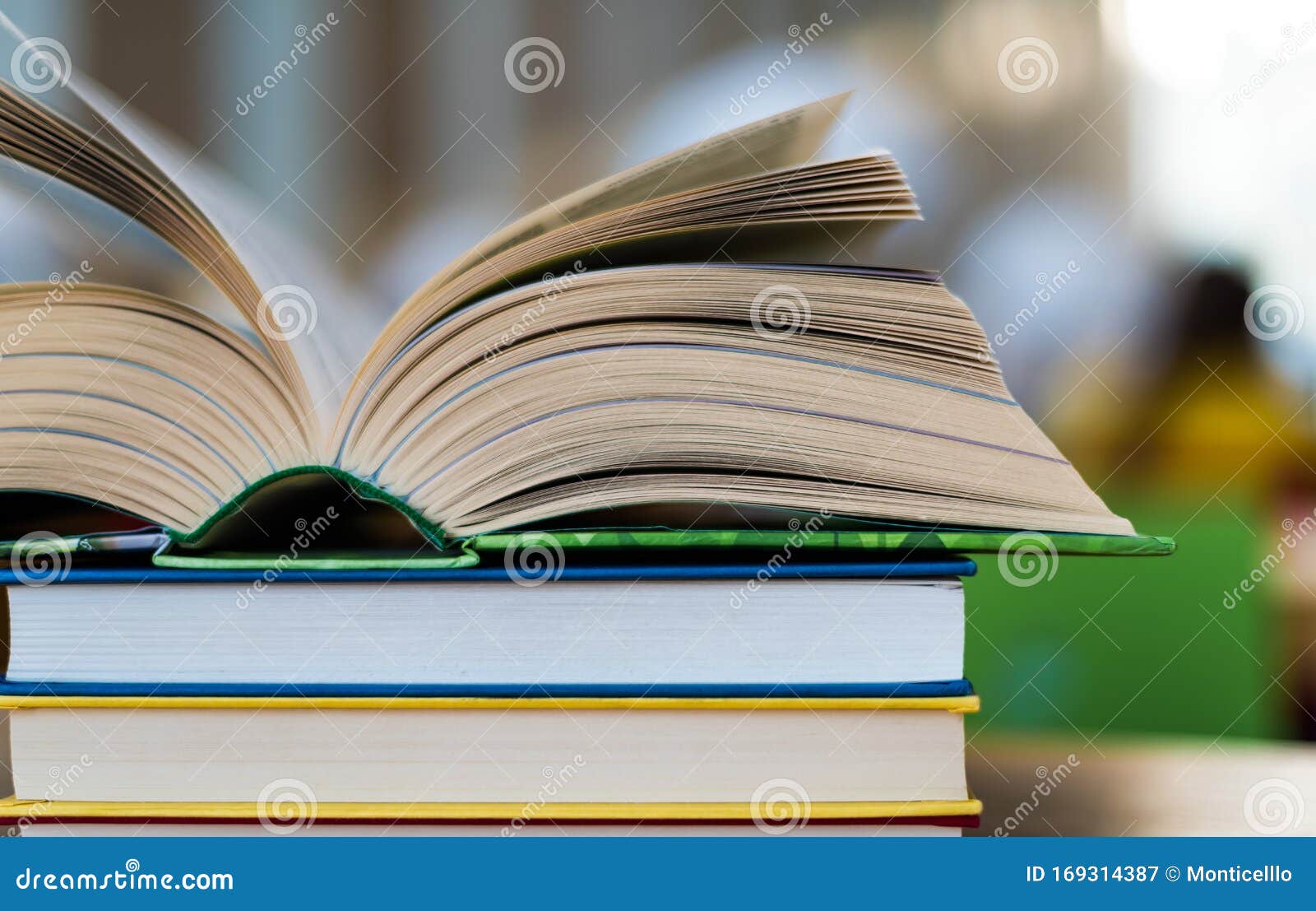 Open Book Lying on the Table in the Library Stock Image - Image of ...