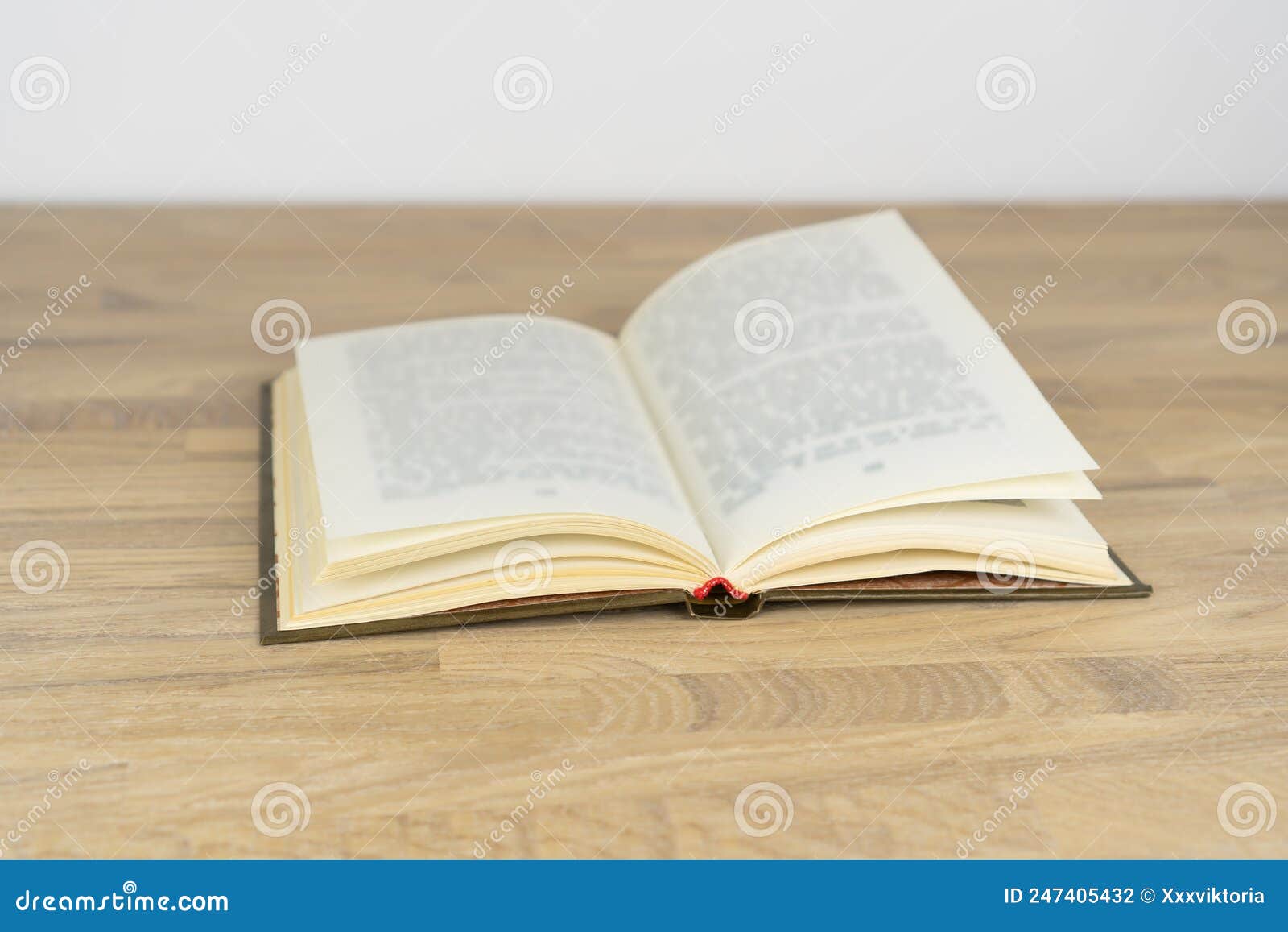 Open Book Lying on Wooden Table Stock Photo - Image of brown, wooden ...