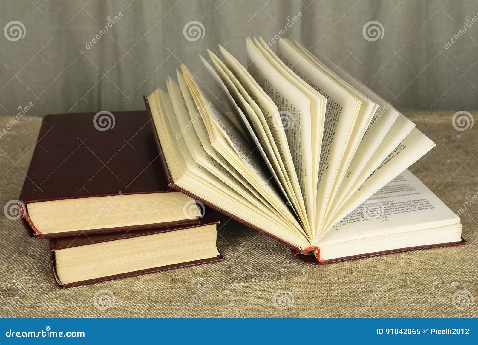 Open Book Lying on a Wooden Table Stock Image - Image of bookshelf ...