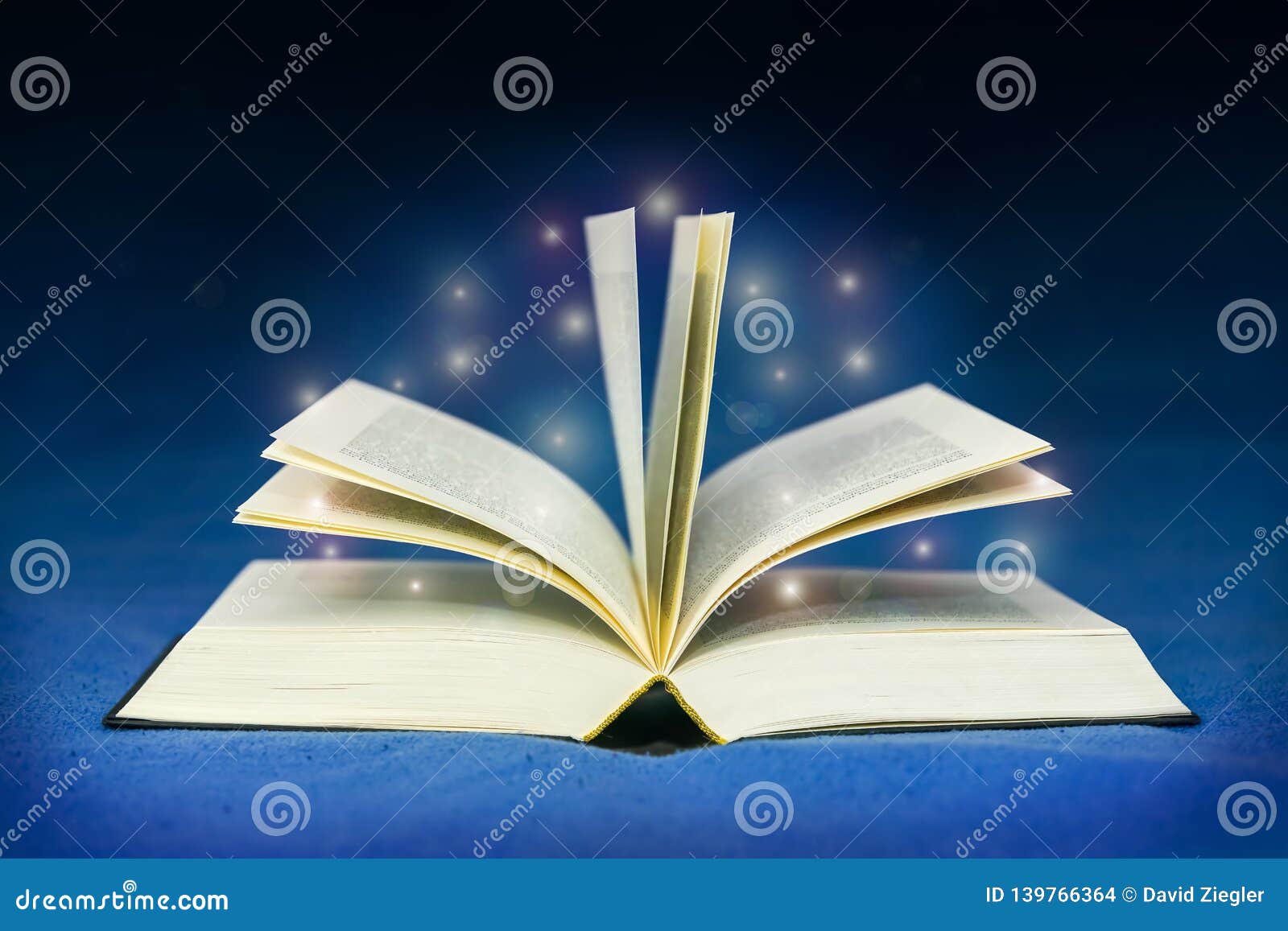 Open Book with Magic Light Effects Stock Photo - Image of cover ...