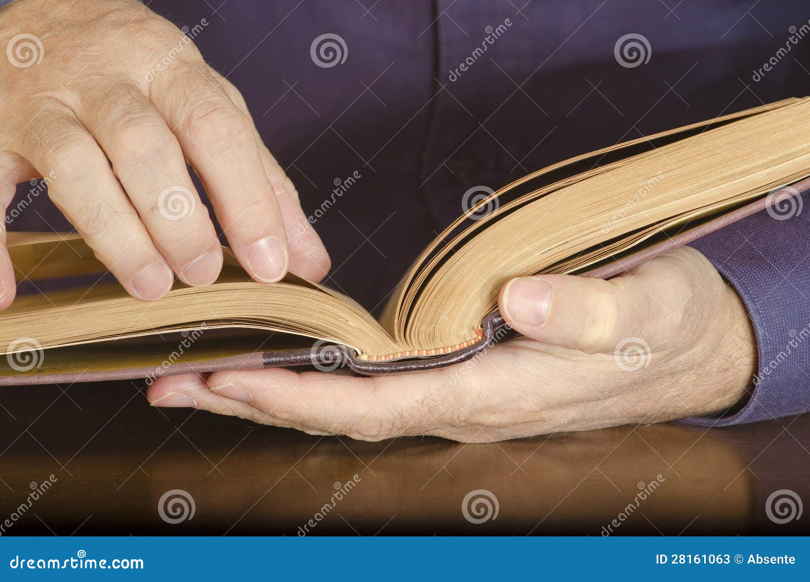 Open Book in Man s Hands stock image. Image of single - 28161063