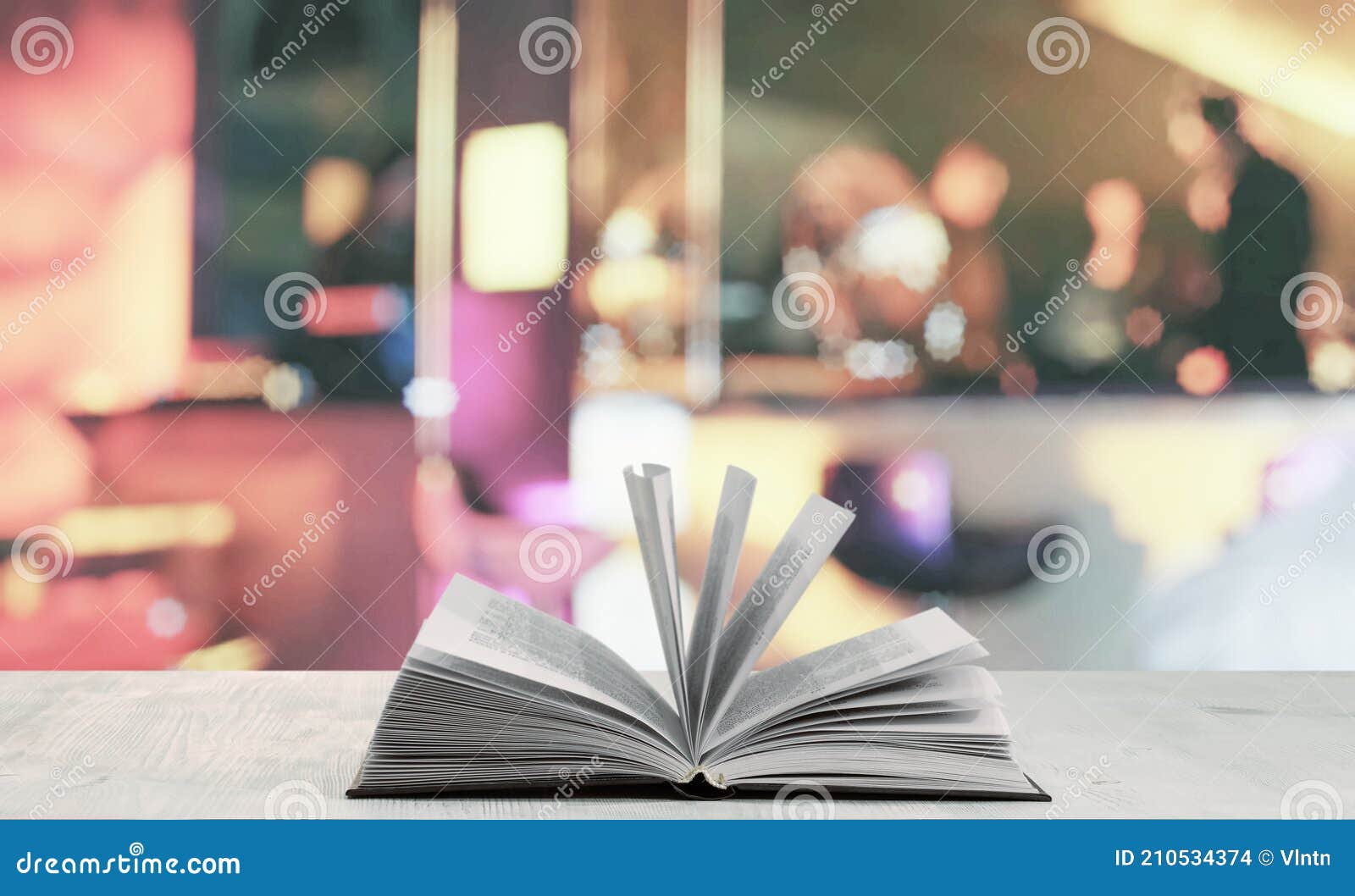 Open book in a night club stock photo. Image of interior - 210534374