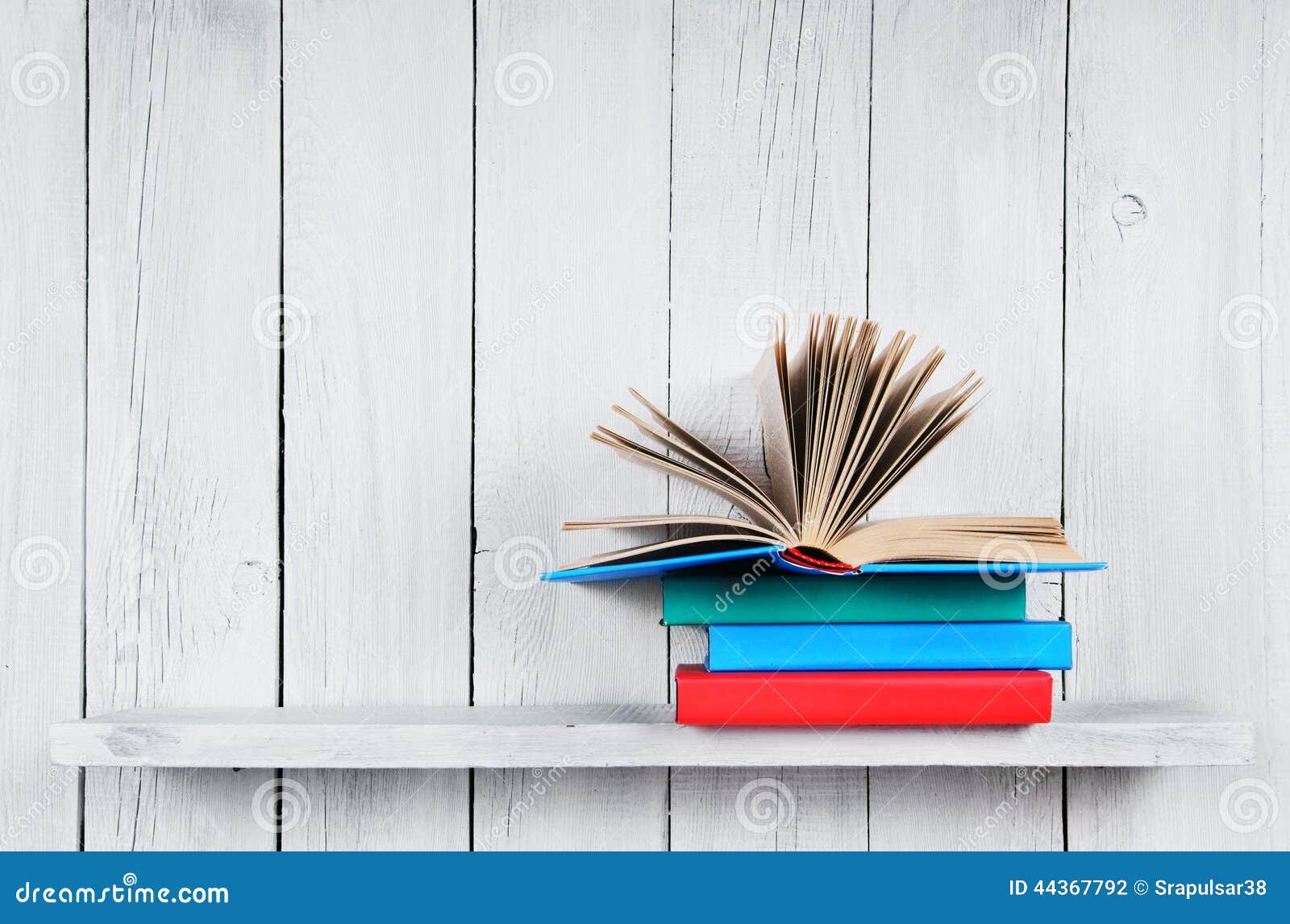 The Open Book on Other Multi-coloured Books. Stock Photo - Image of ...