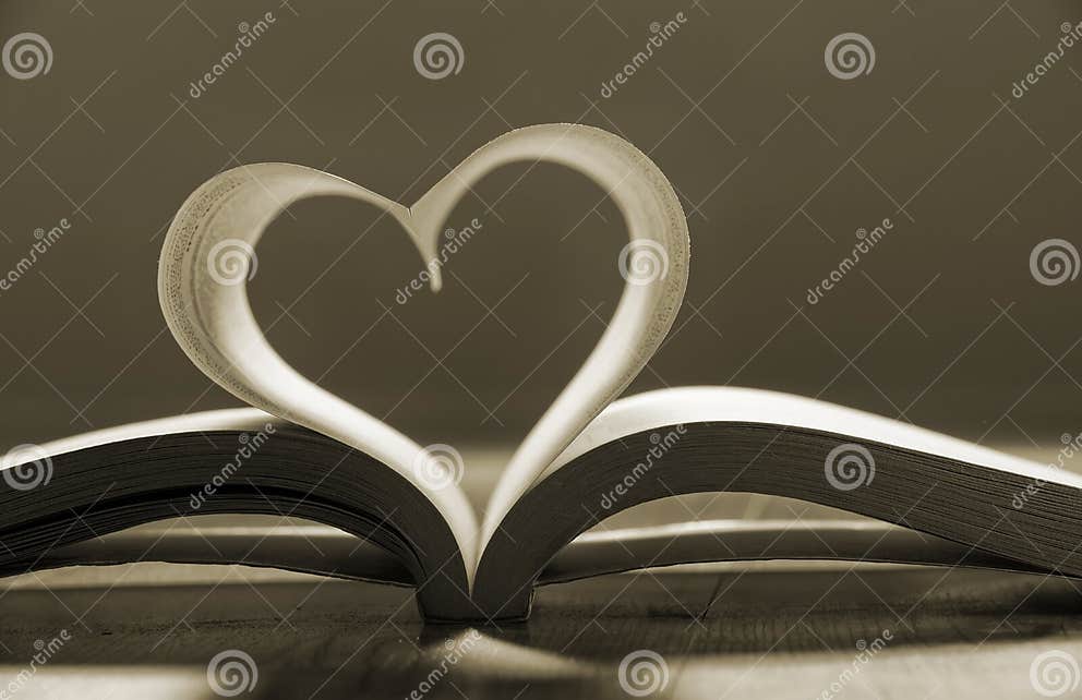 Open Book with Pages Forming Heart Shape . Stock Photo - Image of ...