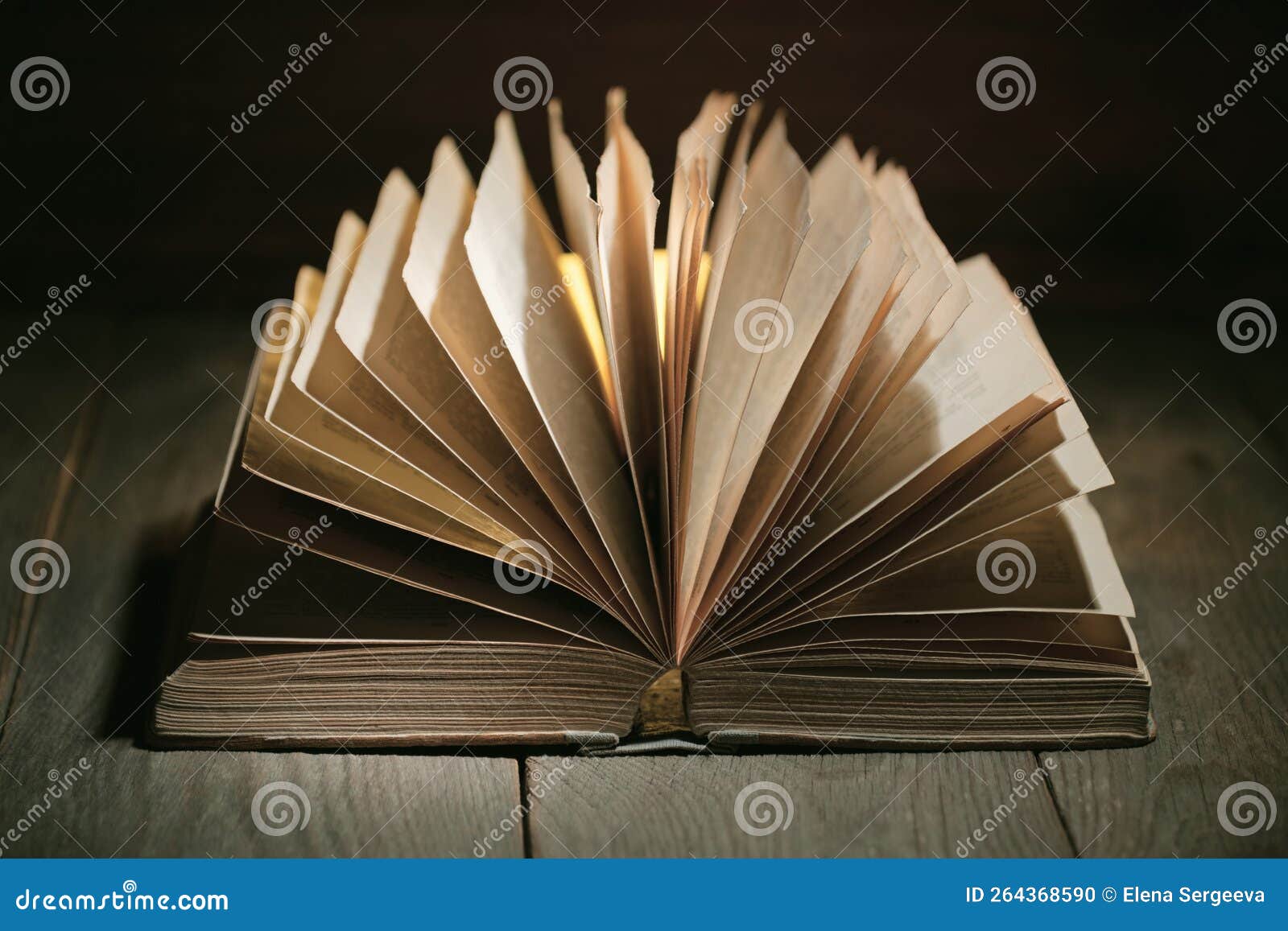 An Open Book with Open Pages, a Thick Old Book on the Table, Knowledge ...