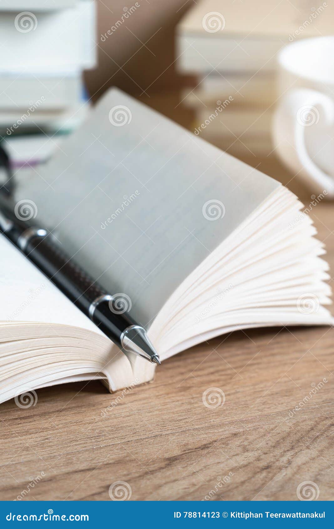Open Book with Pen on Wooden Table Stock Image - Image of book, wood ...