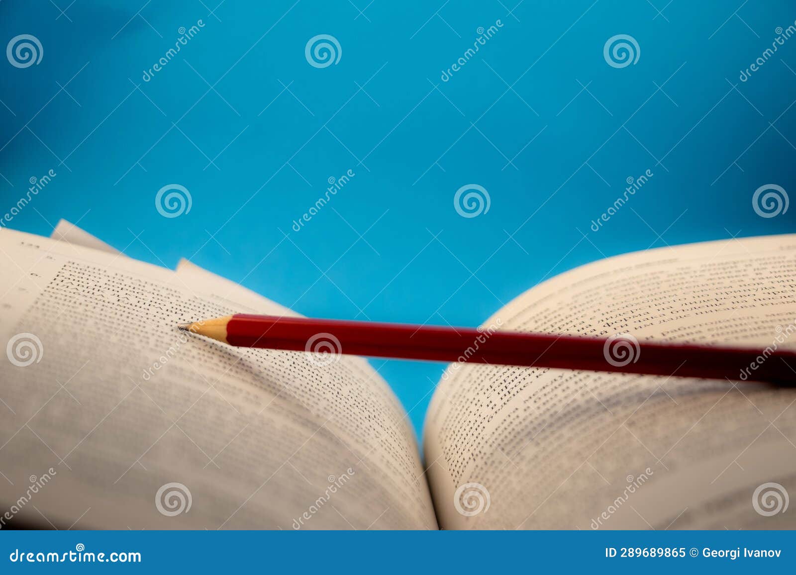 Open book and pencil stock image. Image of study, document - 289689865
