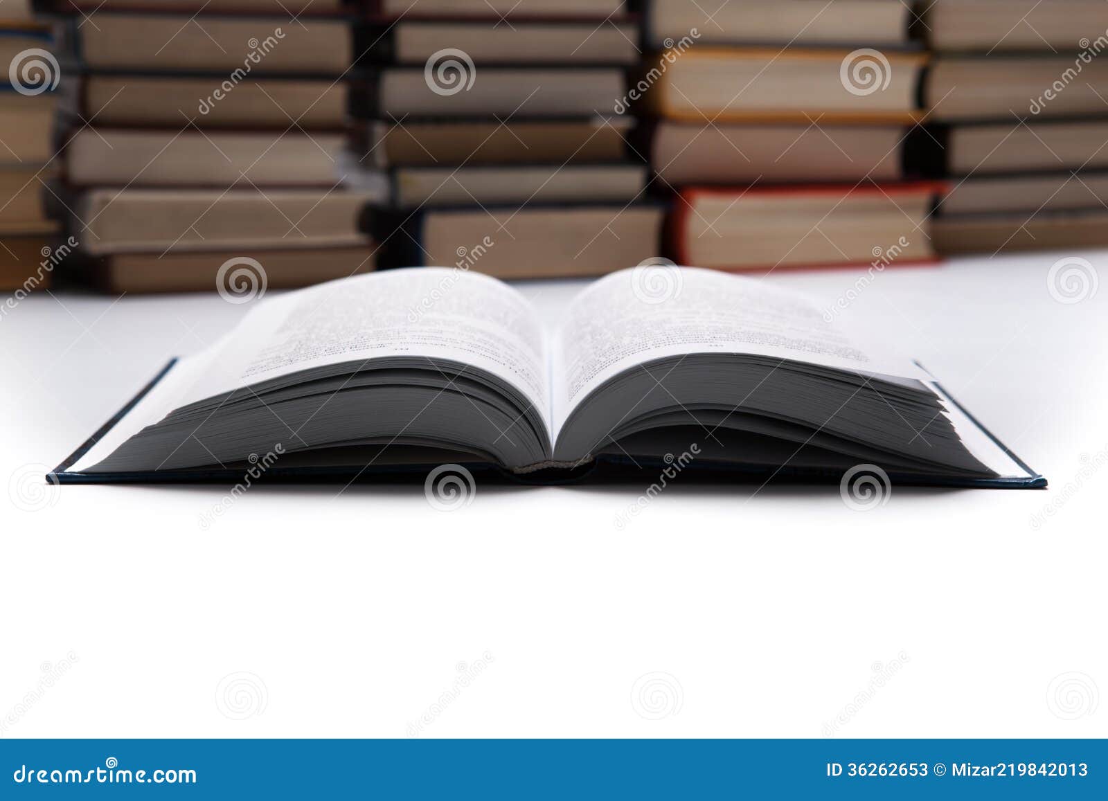 Open Book on with Pile of Books Stock Image - Image of open ...