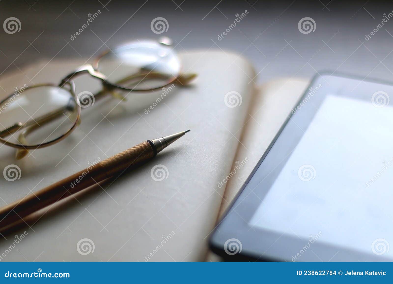 Open Book, Reading Glasses, Mechanical Pencil and E-Reader Stock Photo ...