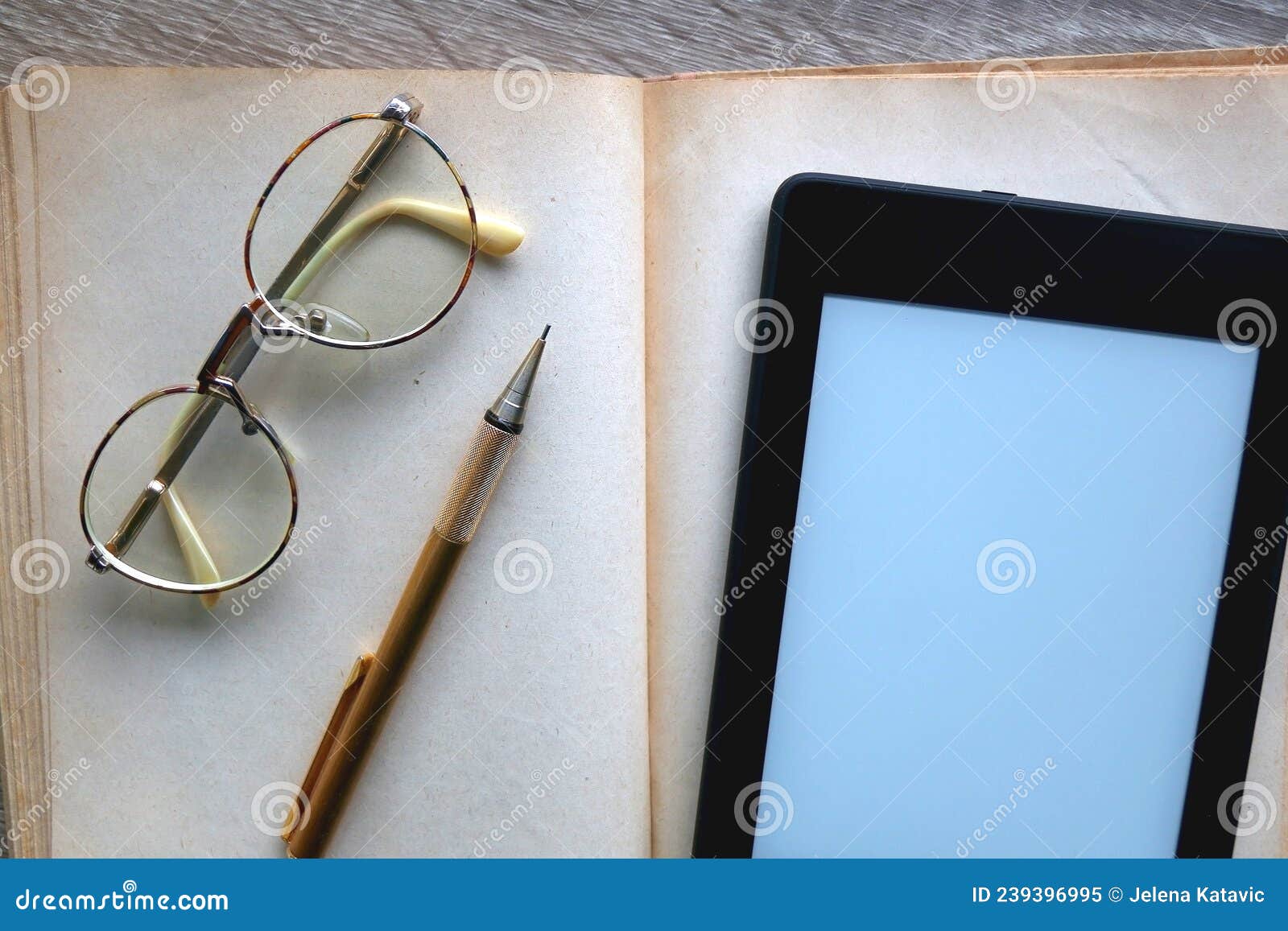 Open Book, Reading Glasses, Mechanical Pencil and E-Reader Stock Image ...