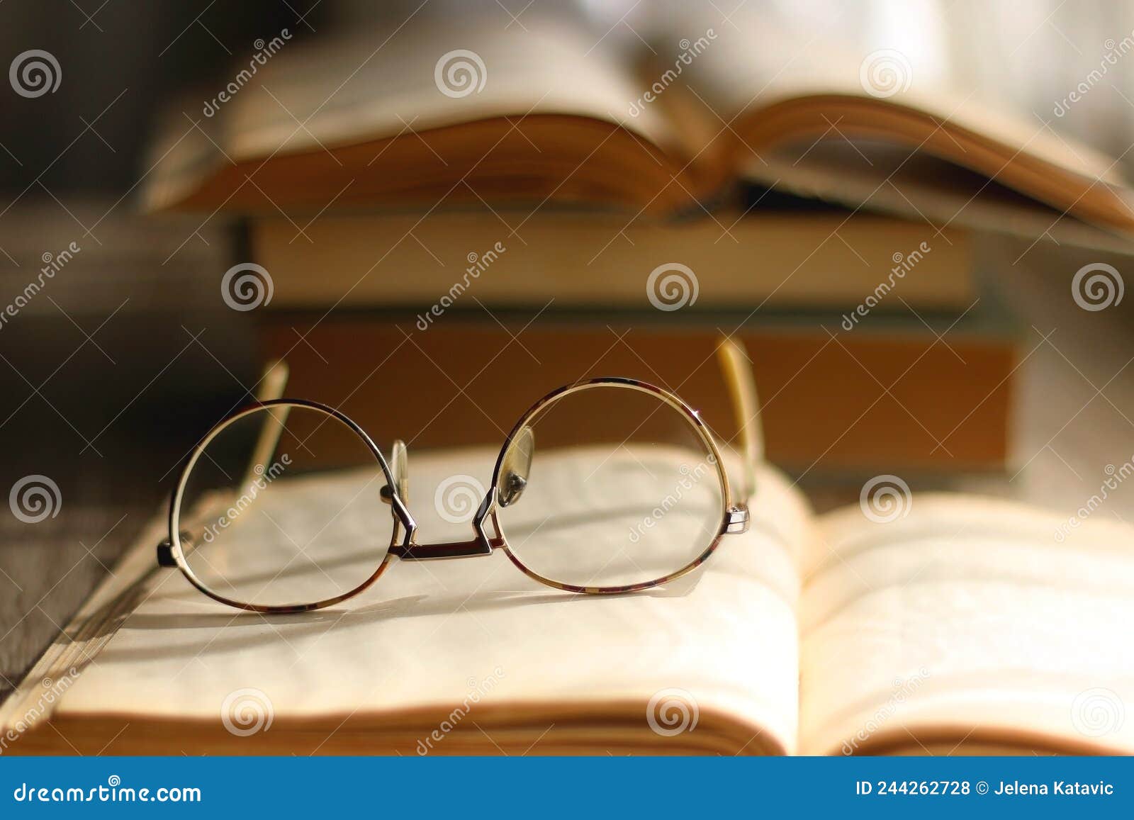 Open Book and Reading Glasses Stock Photo - Image of learn, illuminated ...