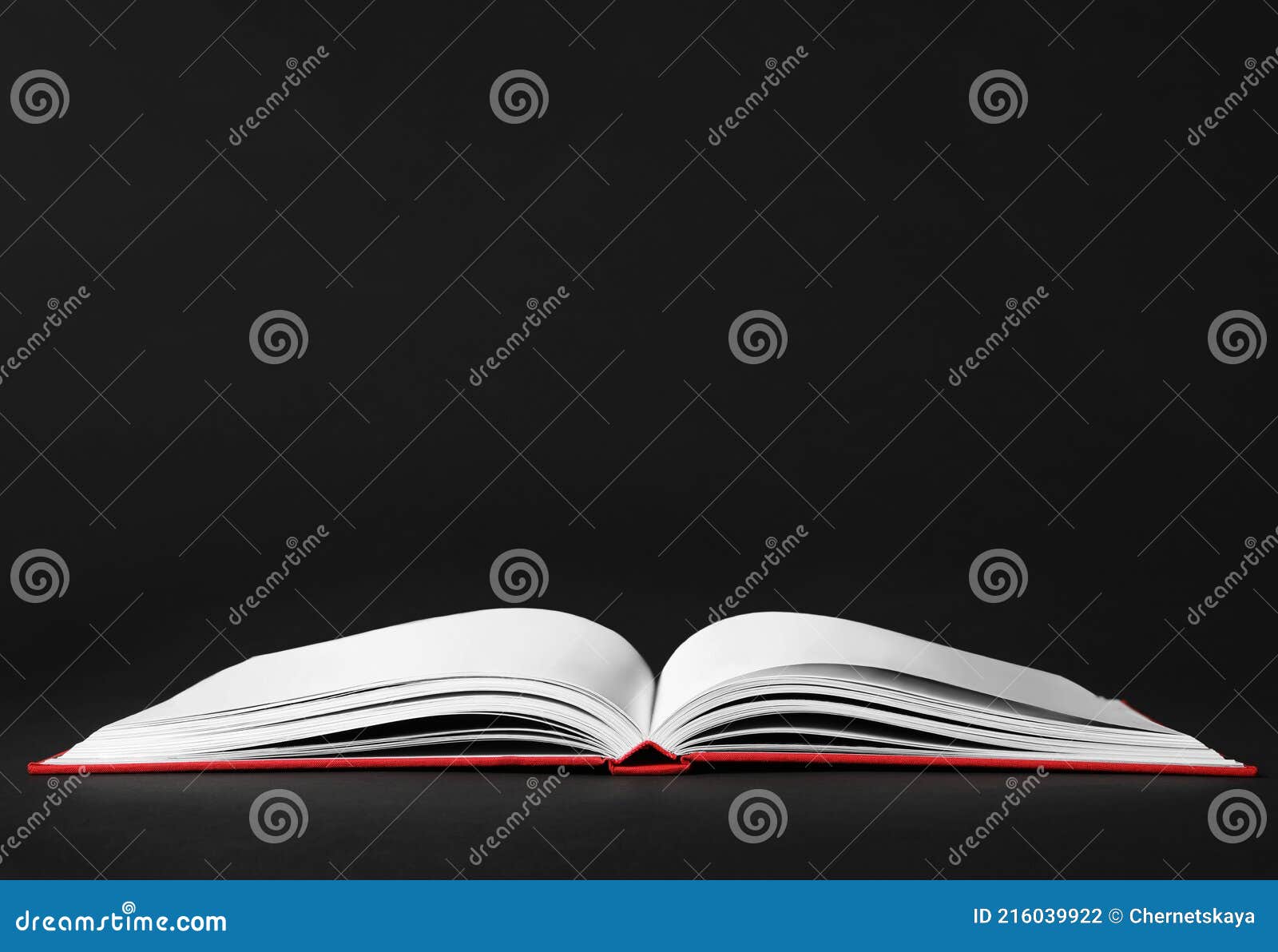Open Book with Red Cover on Black Background. Space for Text Stock ...