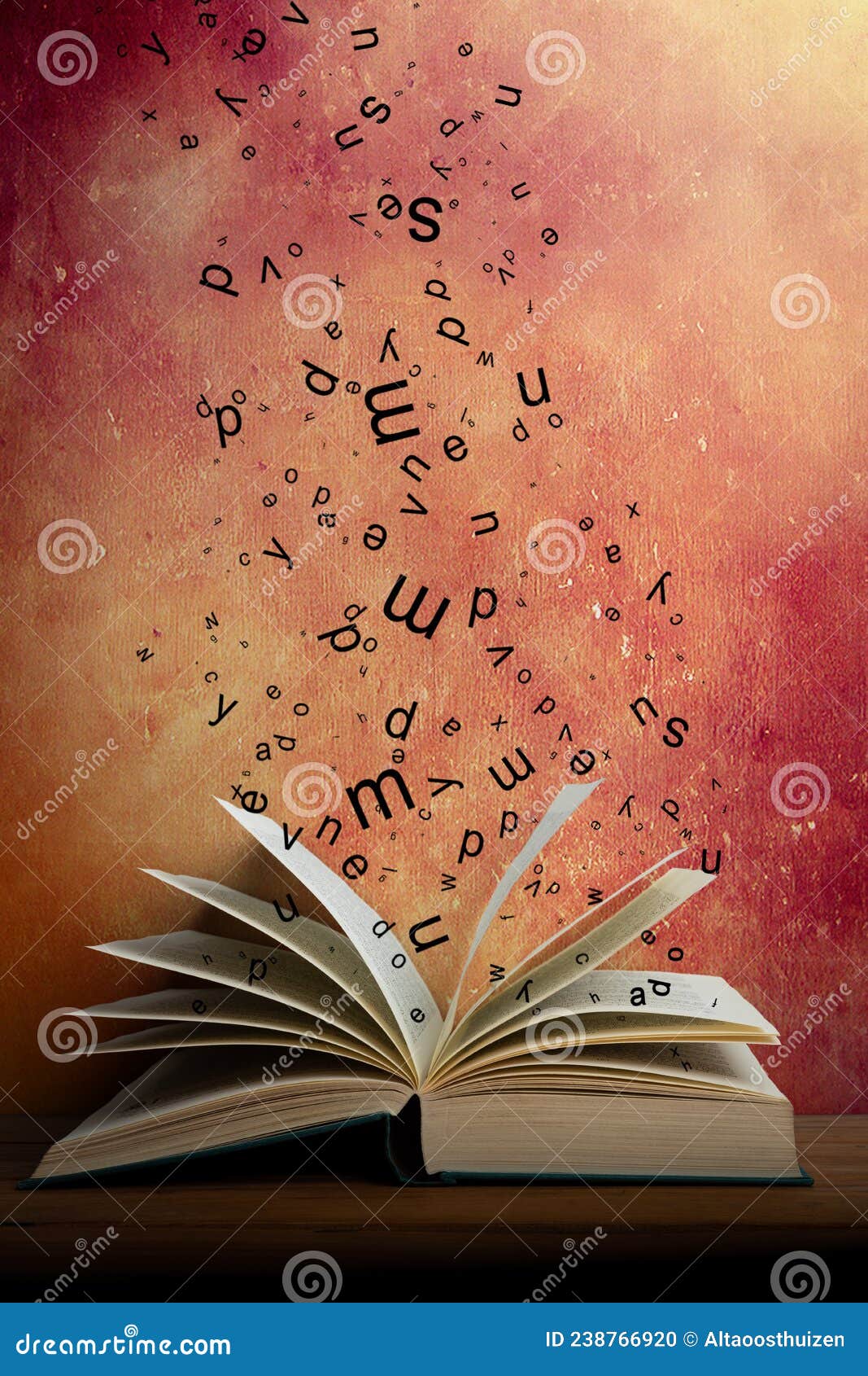 Open Book Spilling Out Letters into Its Surroundings Stock Photo ...